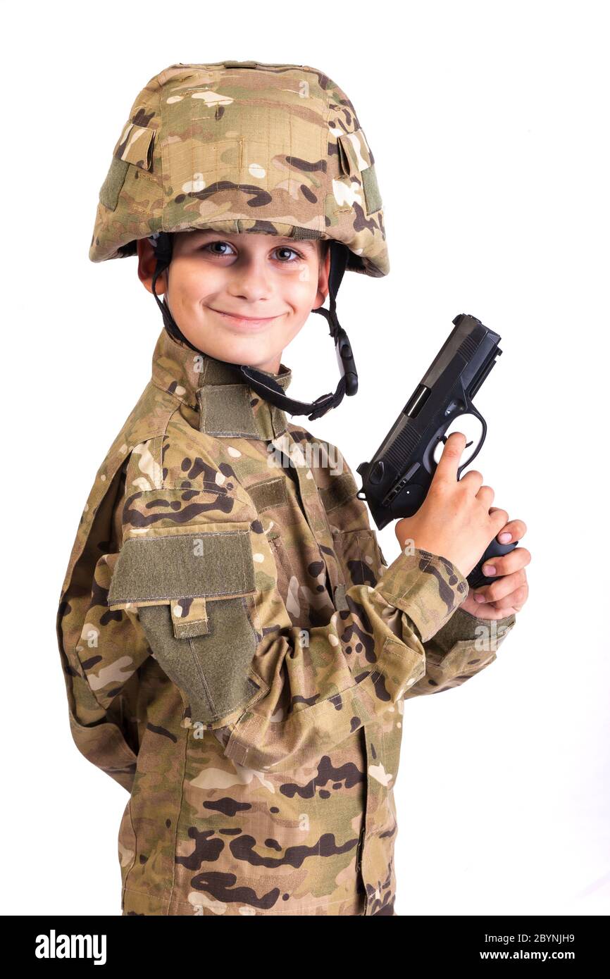 Young soldier with gun Stock Photo - Alamy