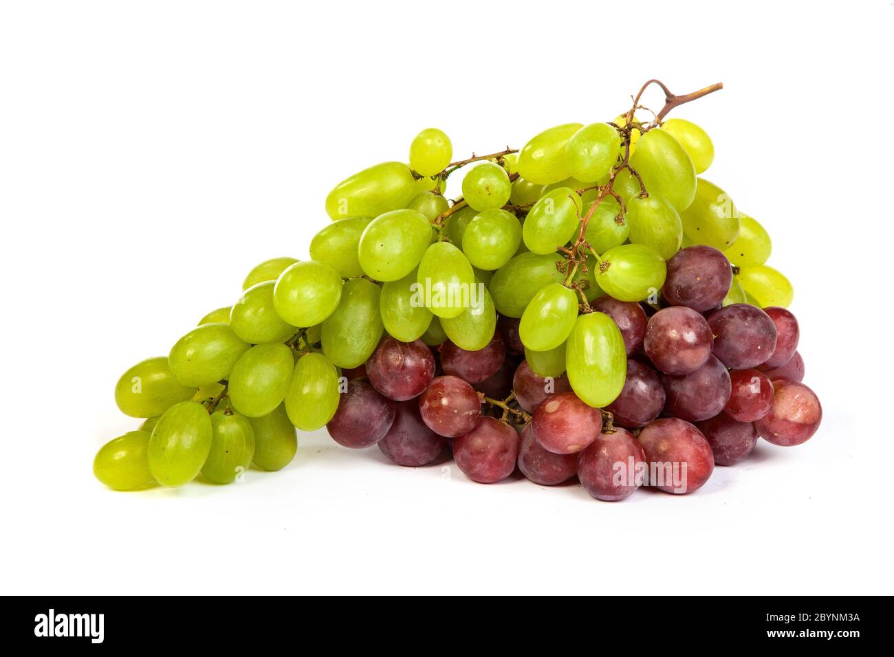 Bunch of White and Red Grapes laying isolated Stock Photo - Alamy