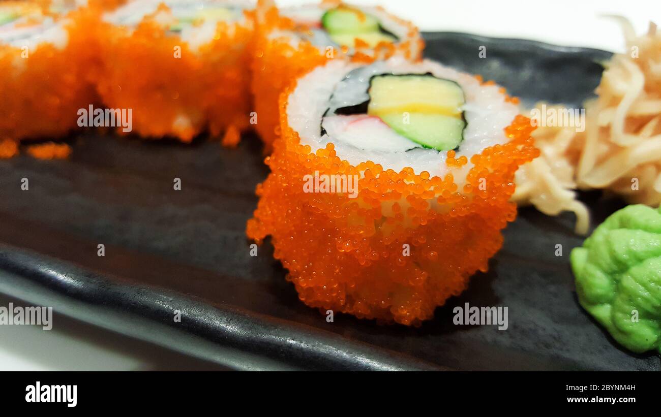 close-up traditional japanese sushi rolls tobiko (flying fish roe Stock ...