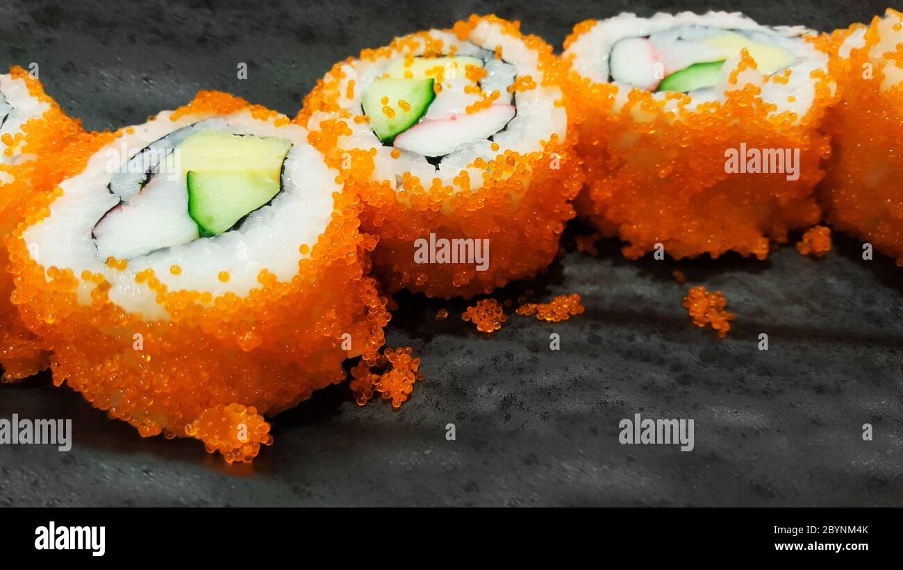 close-up traditional japanese sushi rolls tobiko (flying fish roe Stock ...