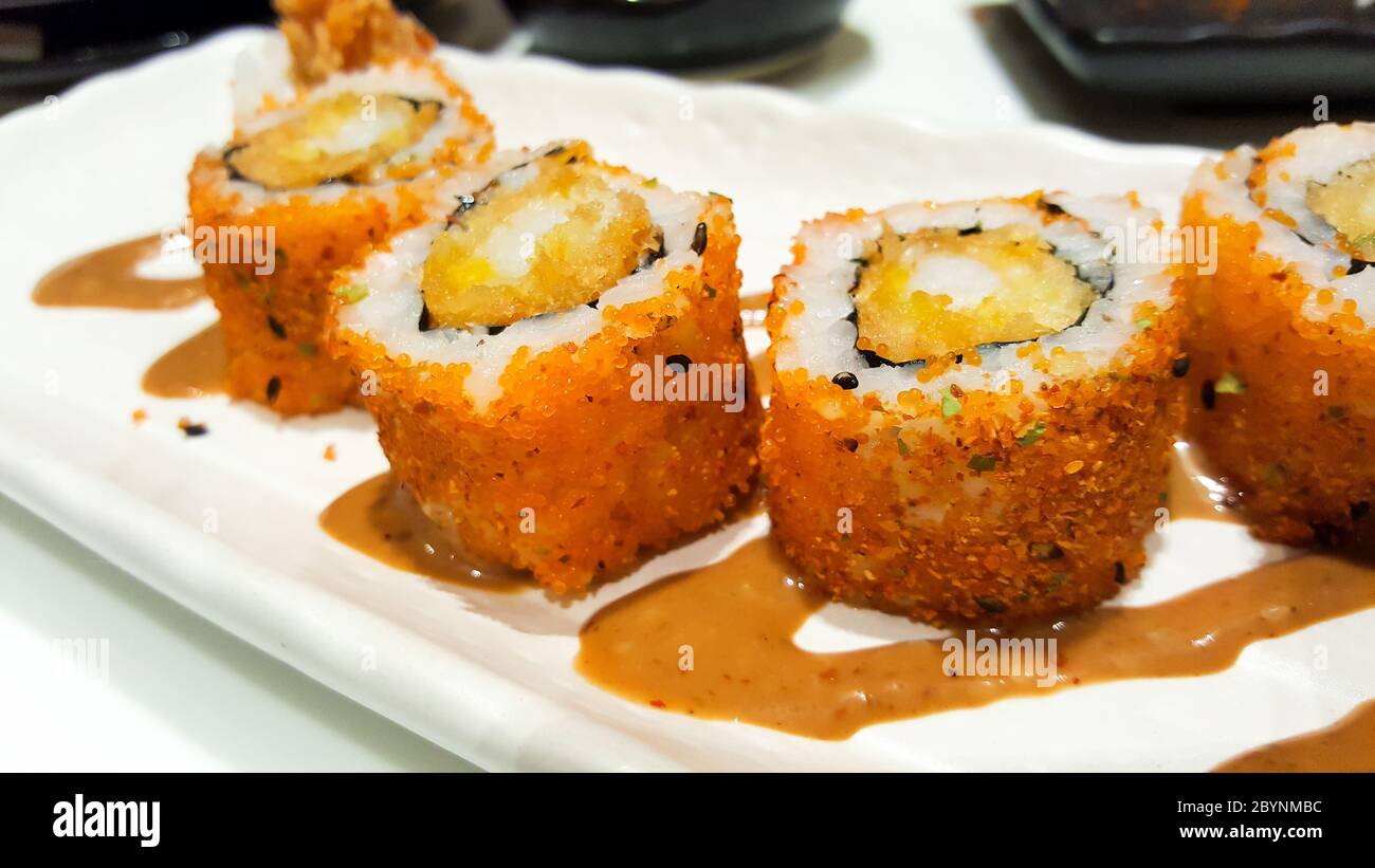 close-up traditional japanese sushi rolls spicy tempura shrimp Stock Photo - Alamy
