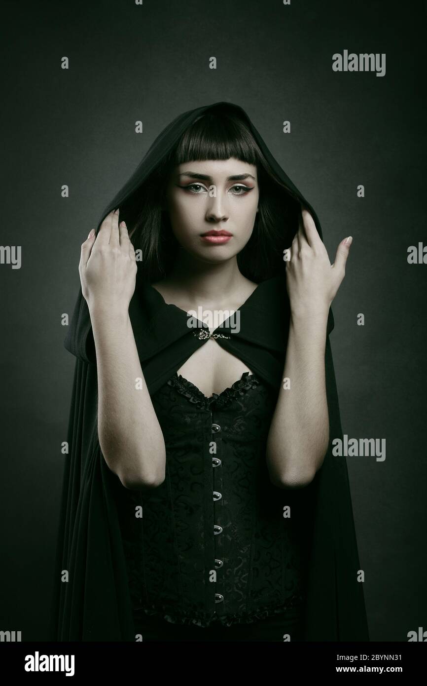 Black cloak with hood hi-res stock photography and images - Alamy