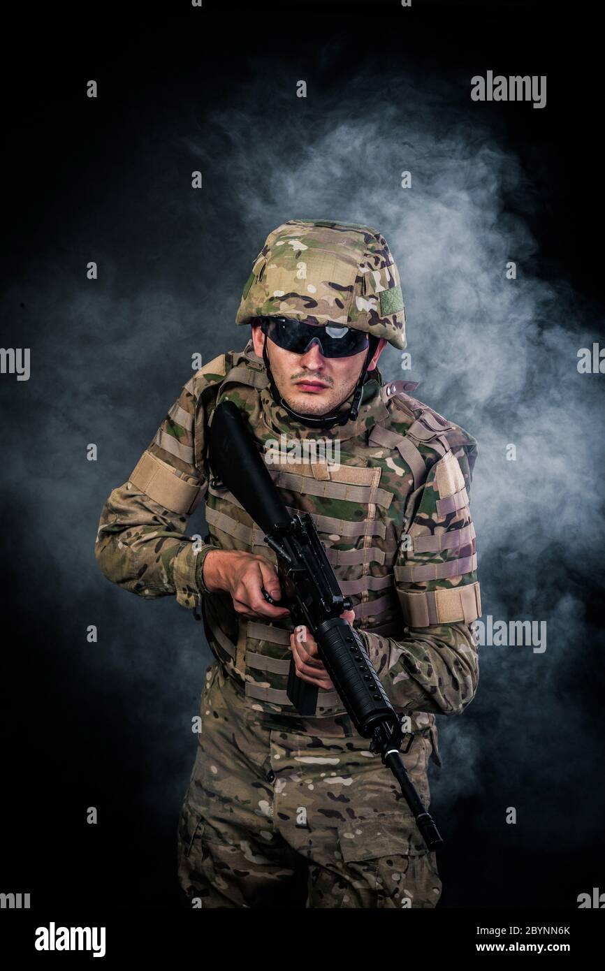 Modern soldier with rifle Stock Photo - Alamy
