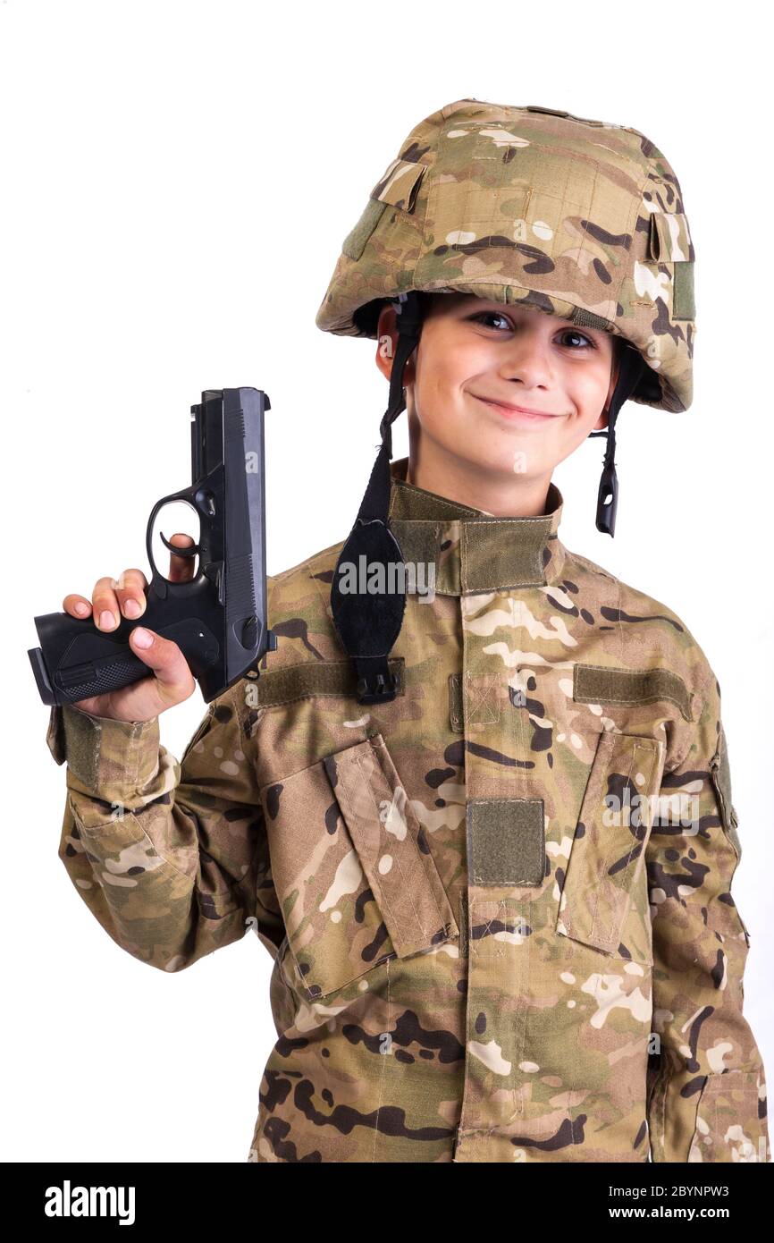 Young soldier with gun Stock Photo - Alamy