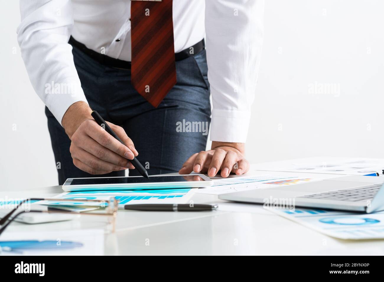 Close-up man hand with analytics Stock Photo - Alamy