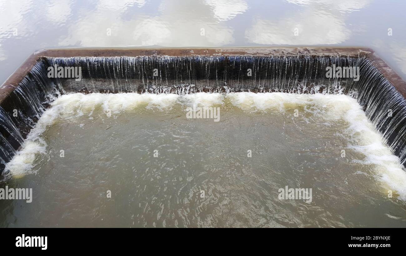 weir, check dam at canal thailand Stock Photo - Alamy