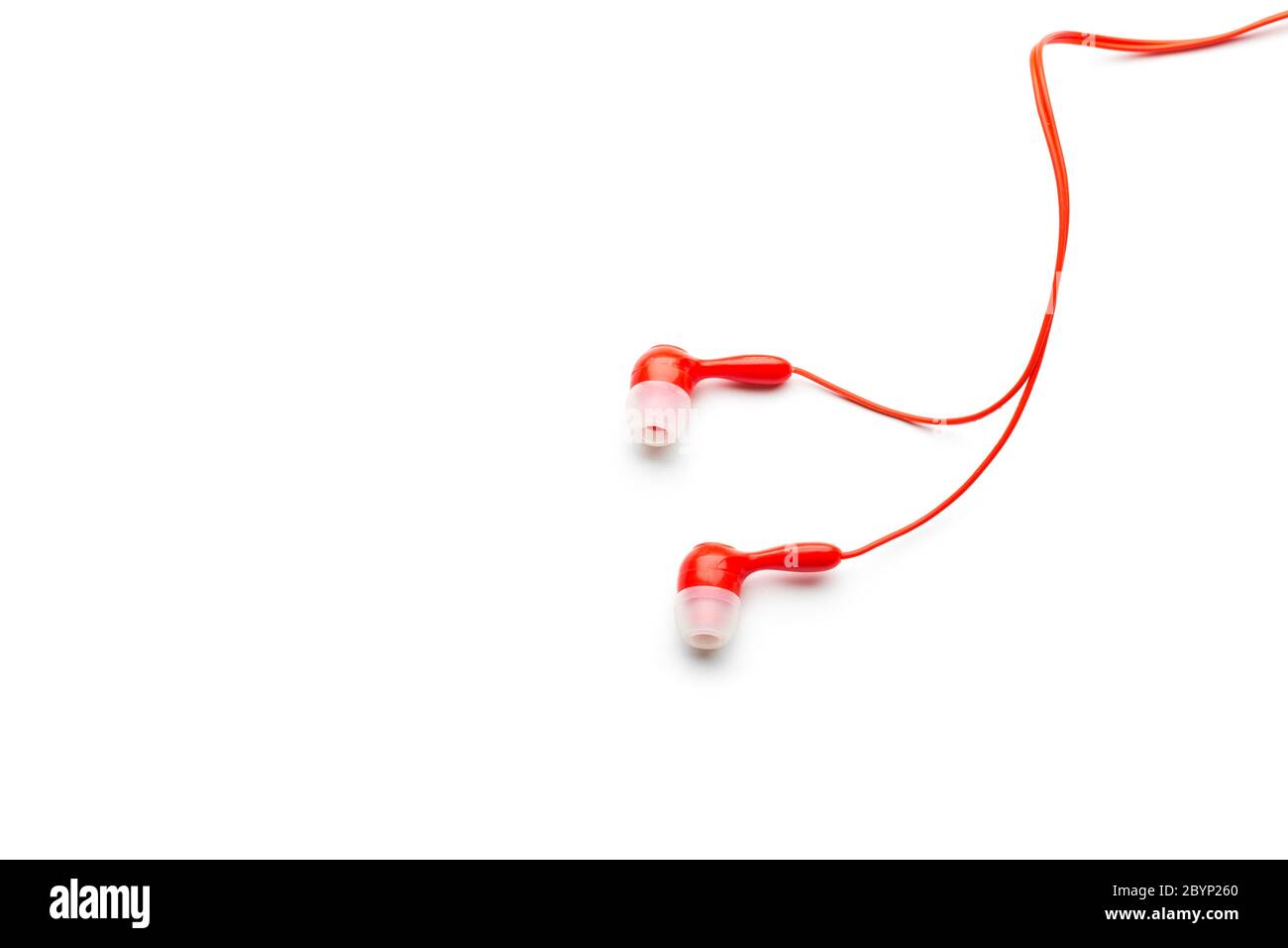 Modern wired classic red headphones isolated on white Modern technology ...