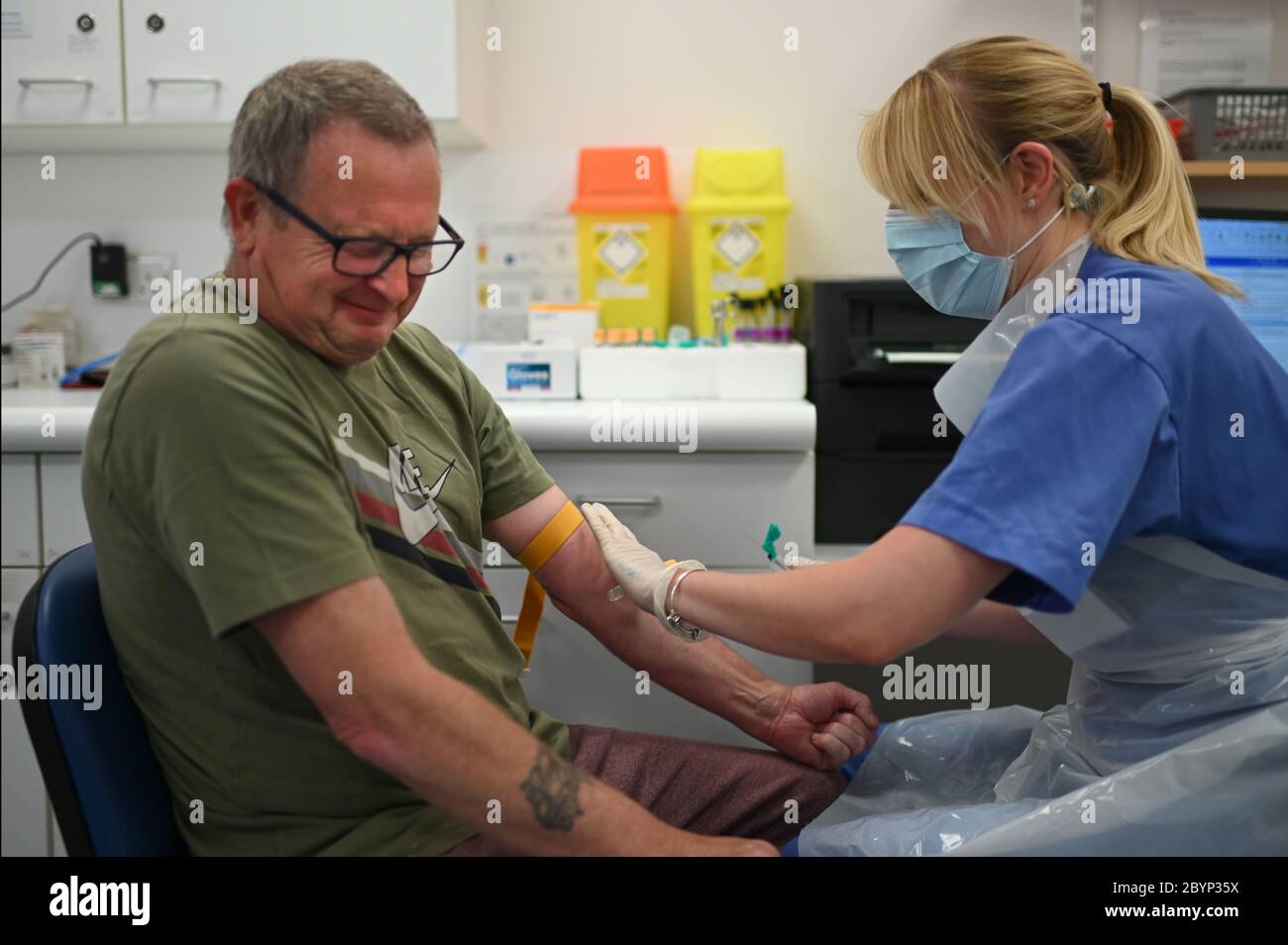 Vicki Taylor, a healthcare assistant wearing personal protective ...