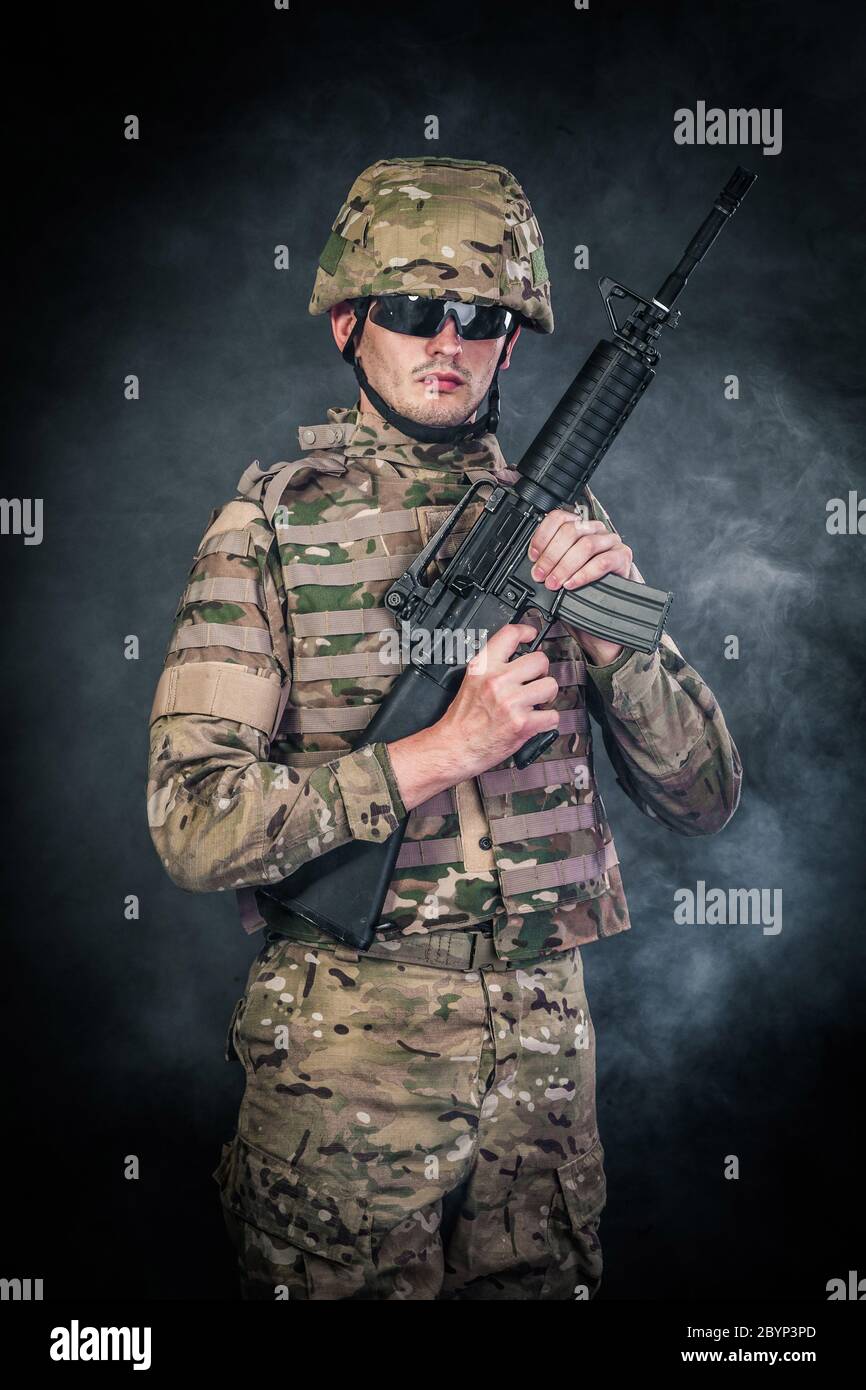 Modern soldier with rifle Stock Photo - Alamy
