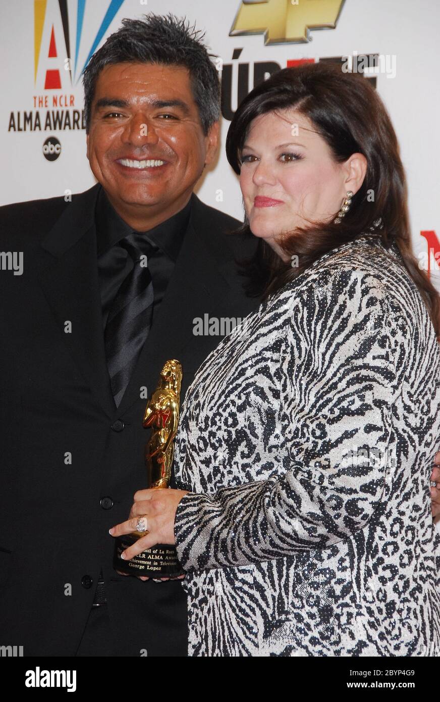 Red carpet retro george lopez and ann serrano hi-res stock photography ...