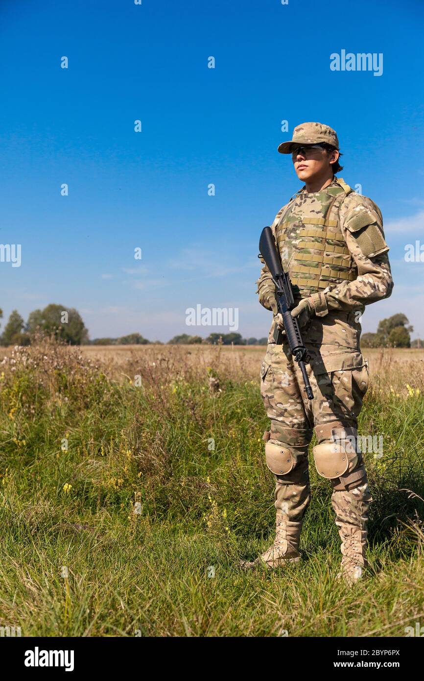 Soldier with a rifle Stock Photo - Alamy