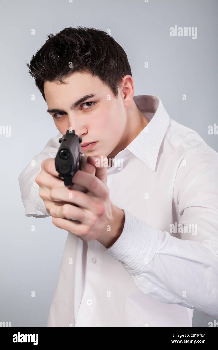 Man aiming gun hi-res stock photography and images - Alamy