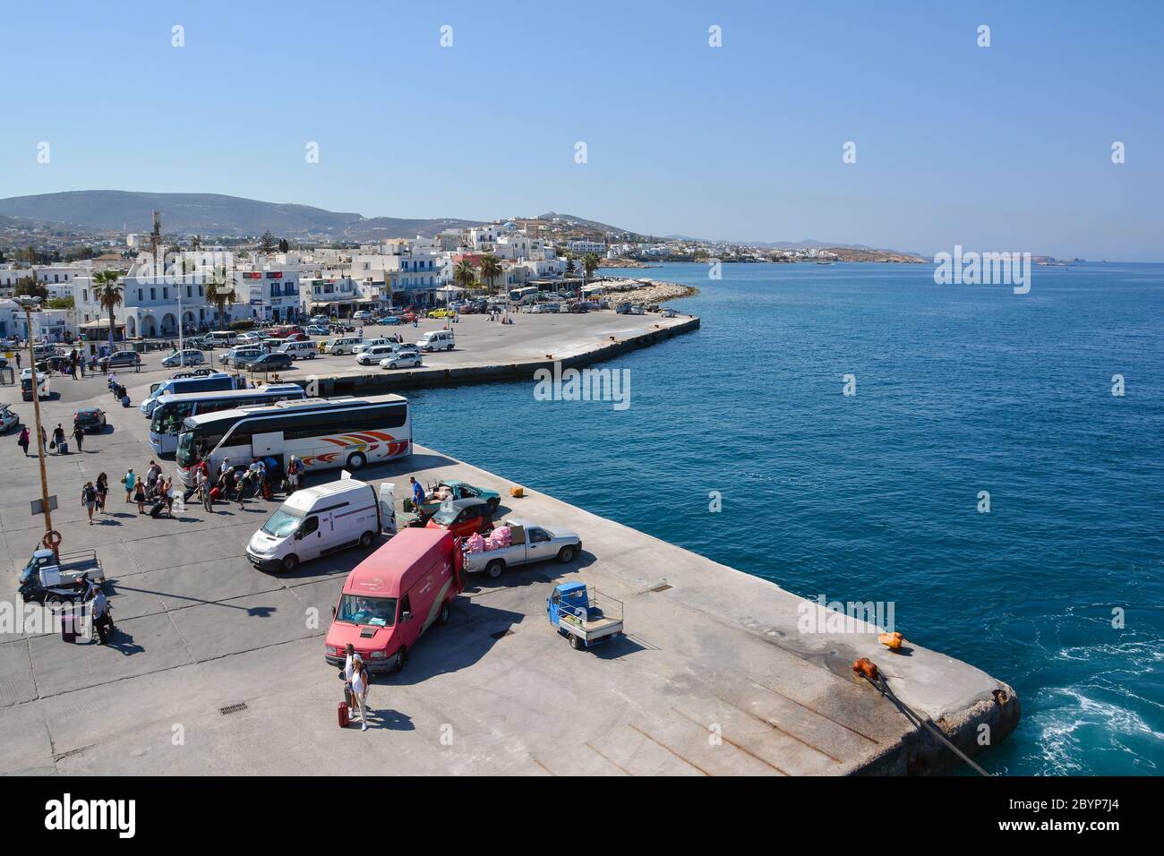 PAROS, GREECE, SEPTEMBER 17, 2016: Passengers and cars disembark from ...
