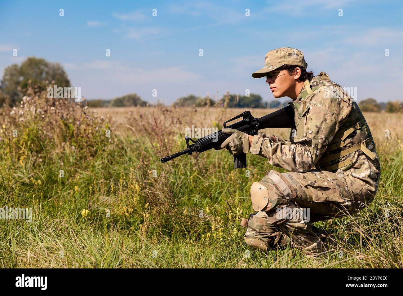 Soldier with a rifle Stock Photo - Alamy