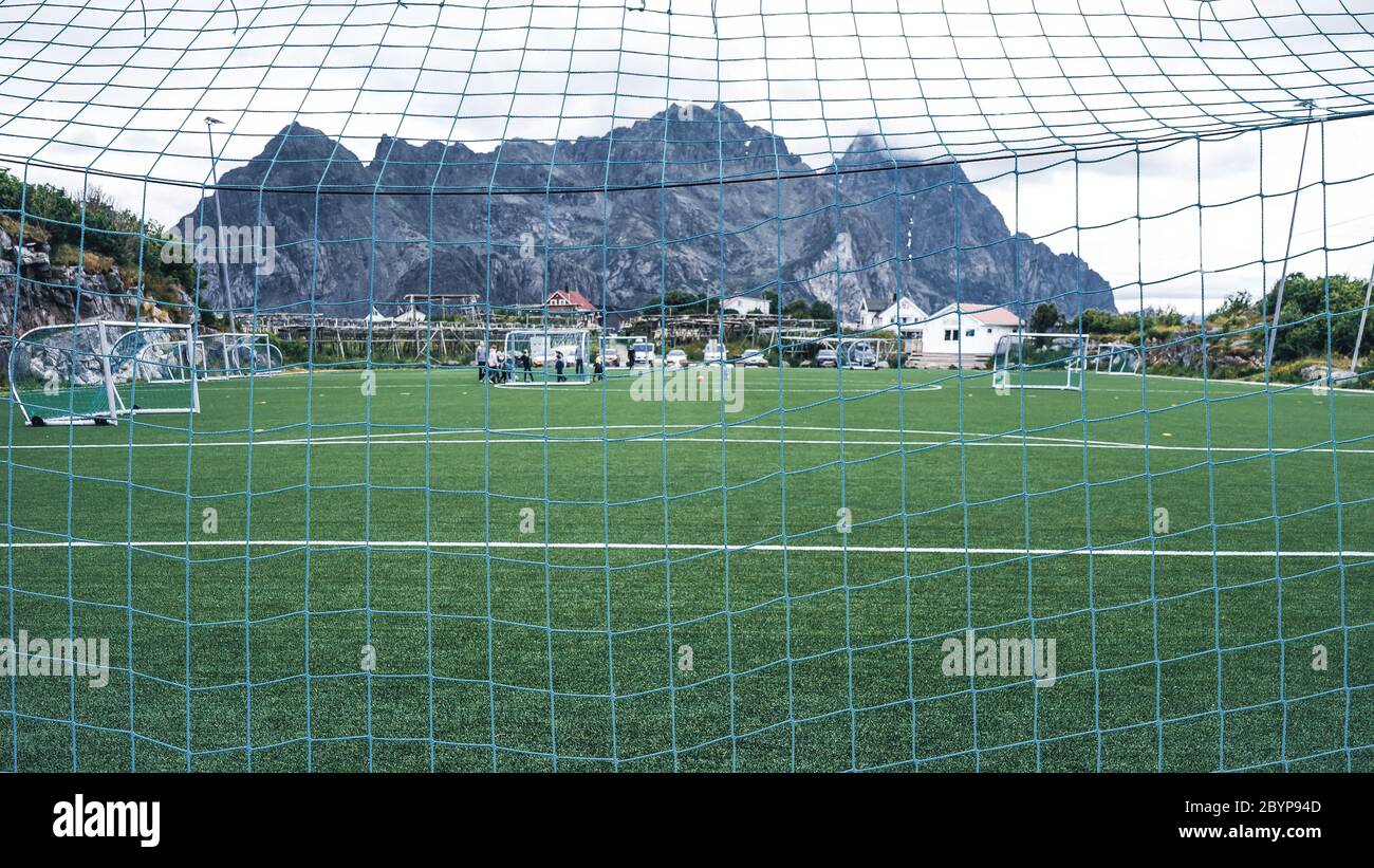 Lines around football field, corner side, made from synthetic lawn ...