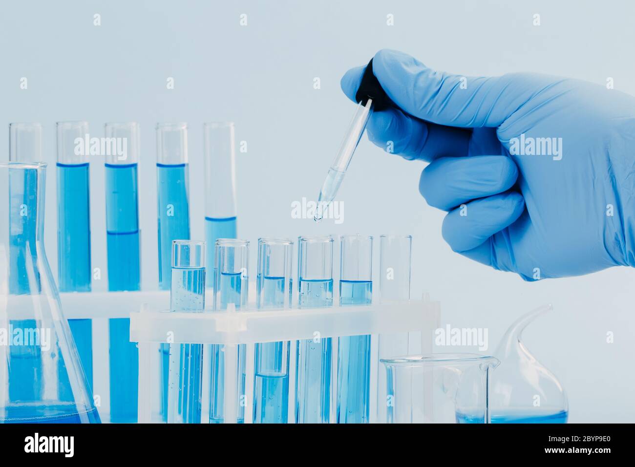 Laboratory glassware with test tubes. scientific laboratory equipment ...