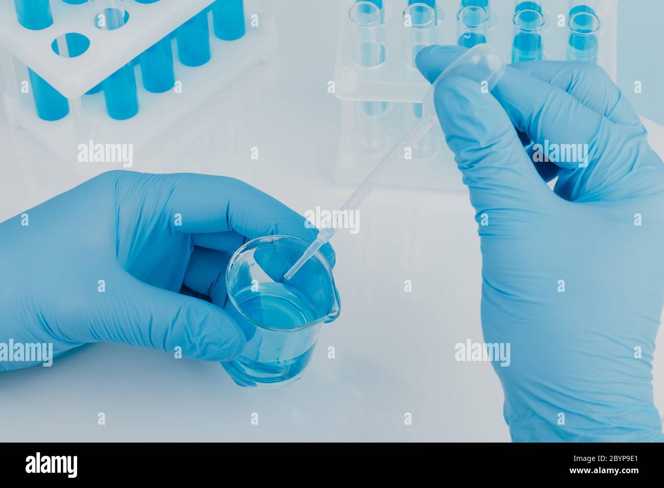 Laboratory glassware with test tubes. scientific laboratory equipment ...