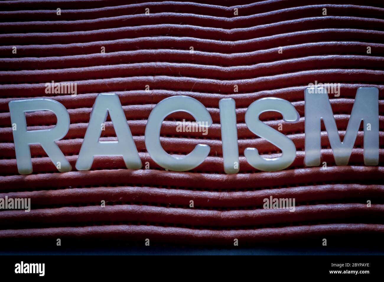 Racism - word from letters, the belief of inequality of human races ...