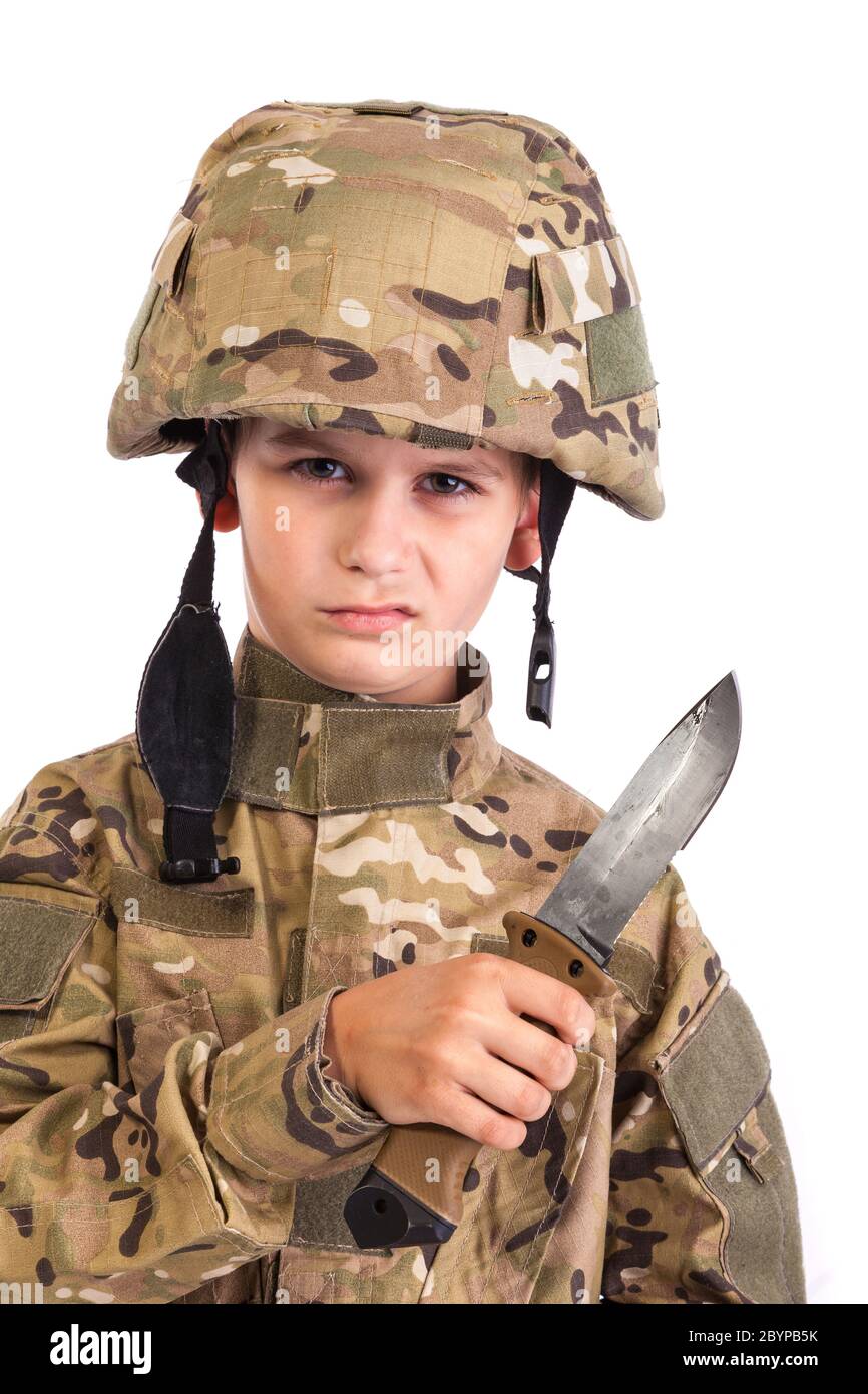 Young soldier with knife Stock Photo - Alamy