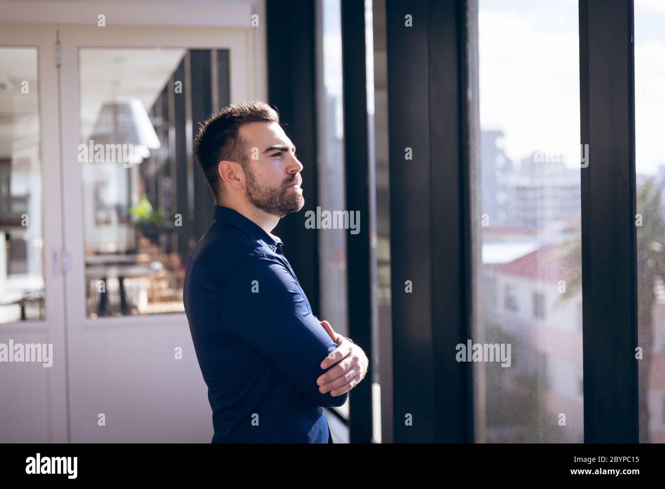 Young casual man thinking working hi-res stock photography and images ...