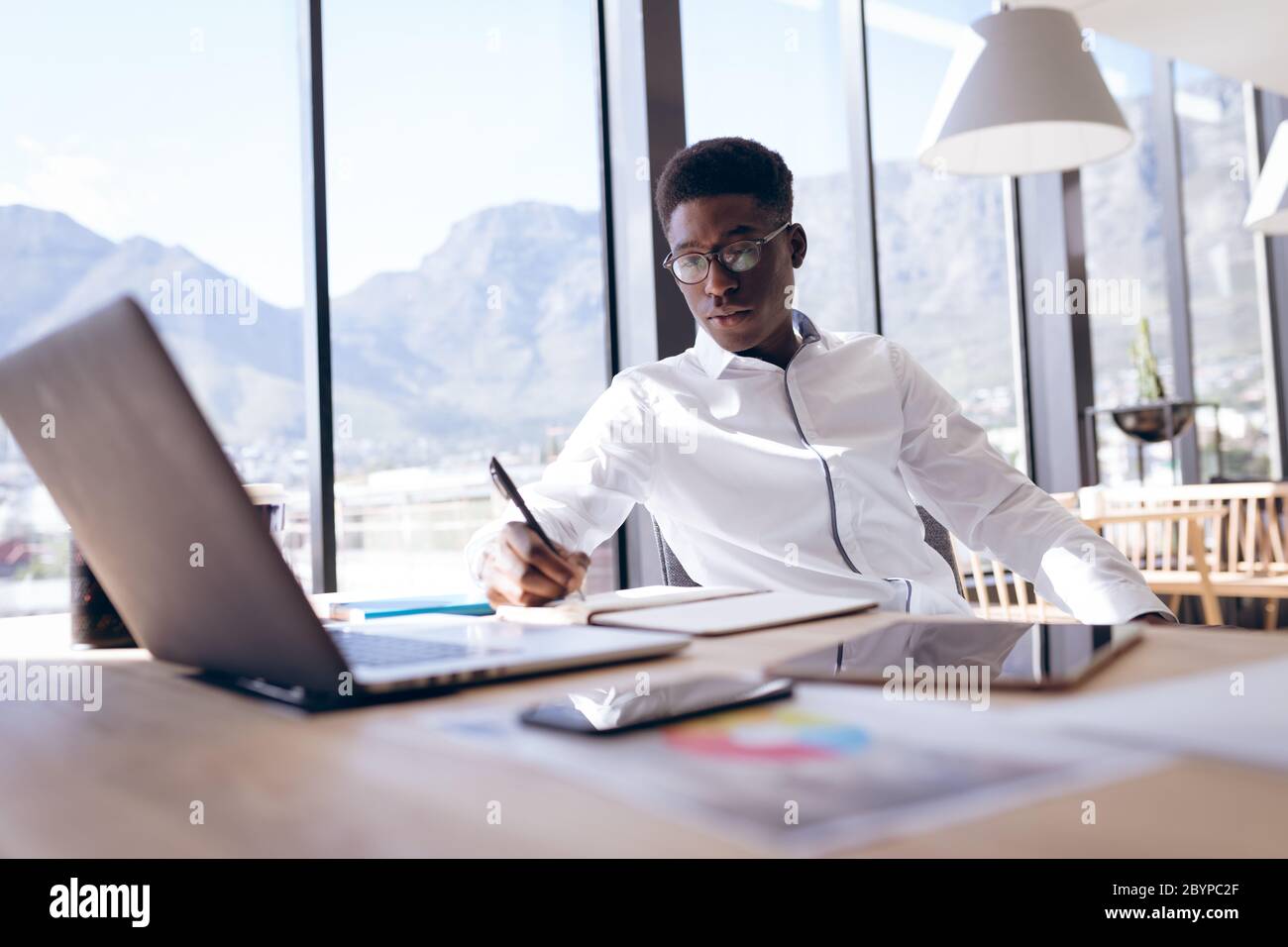 African american businessman working in hi-res stock photography and ...