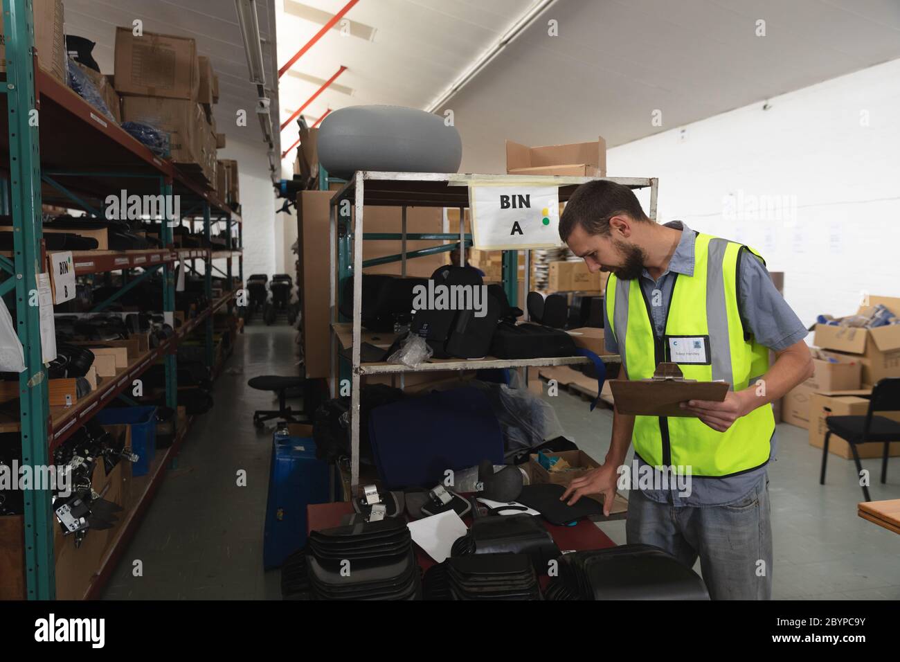 Inspecting parts hi-res stock photography and images - Alamy