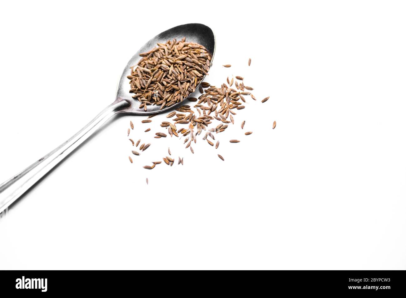 Cumin seeds isolated on white background Stock Photo - Alamy