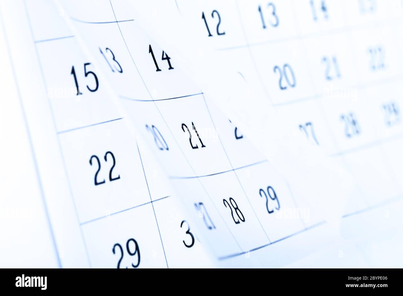 Closes a calendar page in blue. flipping calendar 2020 Stock Photo - Alamy