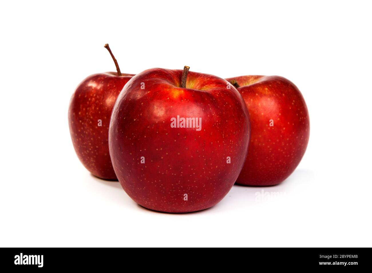 Three shiny red apples isolated on white Stock Photo - Alamy