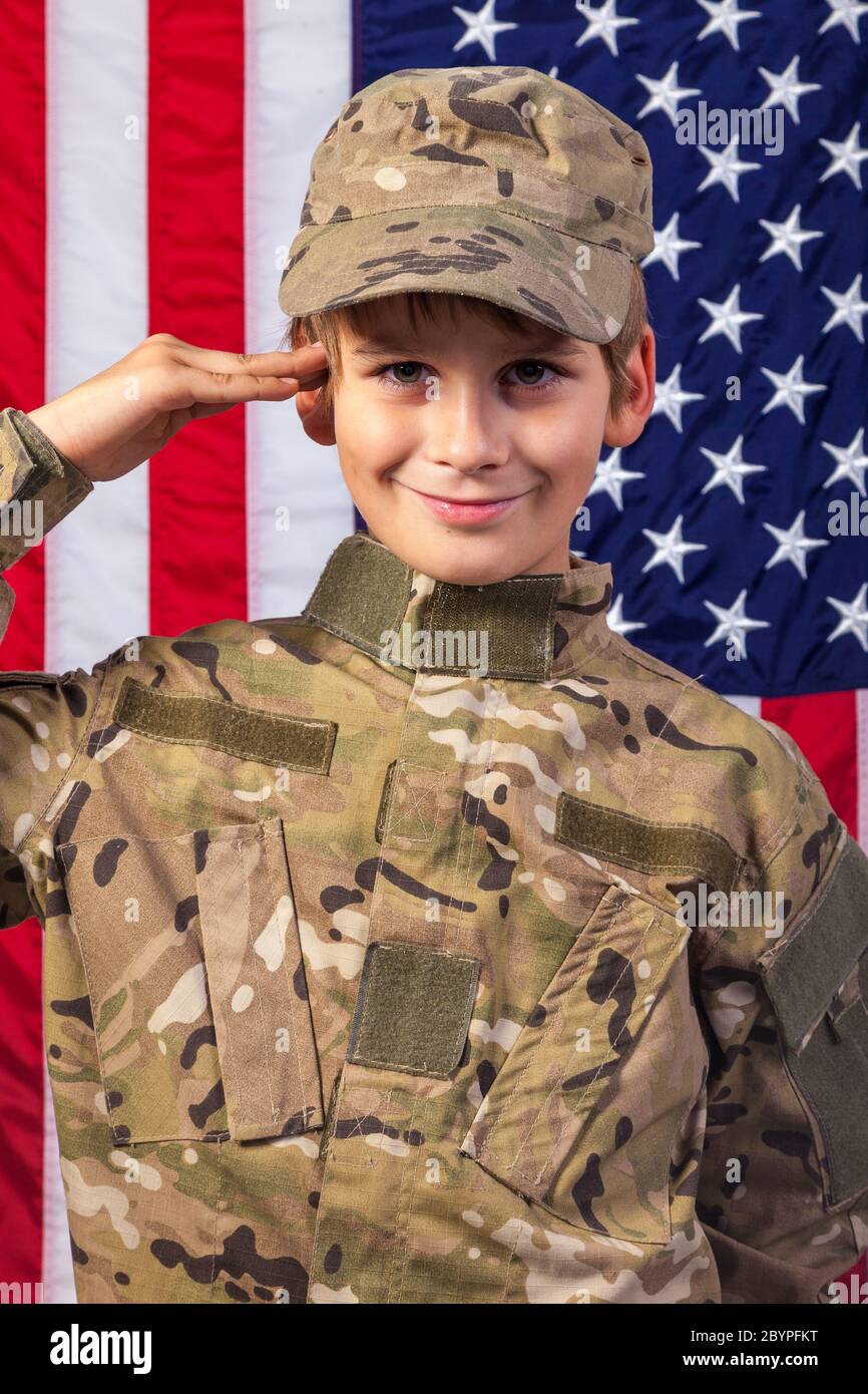 One child saluting flag hi-res stock photography and images - Alamy