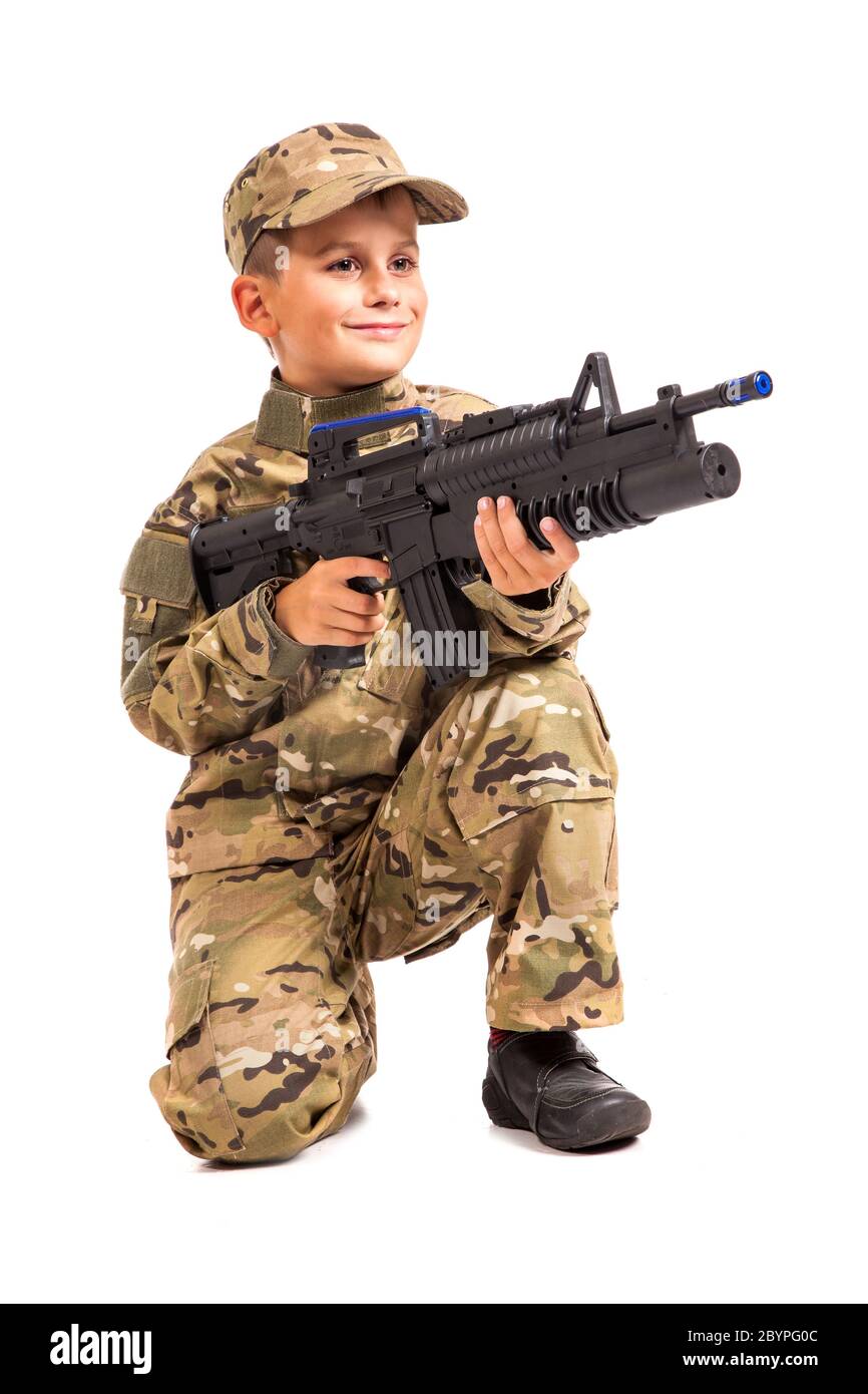 Young soldier with rifle Stock Photo - Alamy