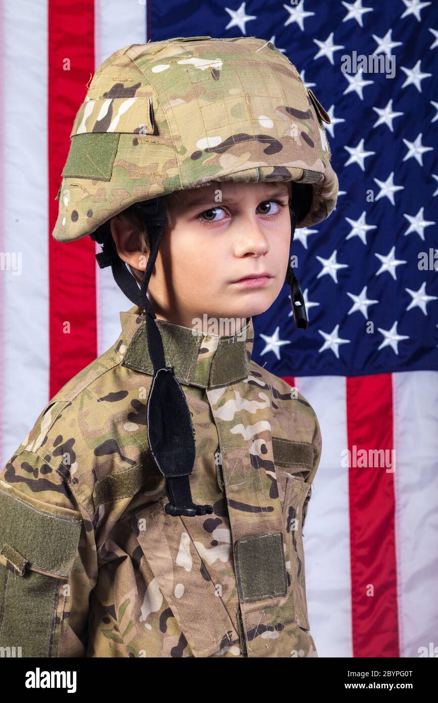 Child dressed as soldier saluting hi-res stock photography and images ...