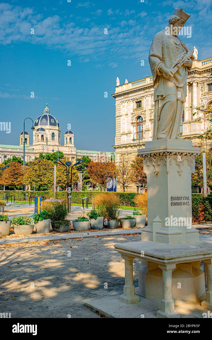 Statue of priest with figure of crucified Jesus in Vienna downtown at ...