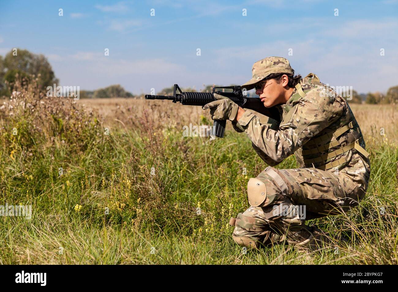 Soldier with a rifle Stock Photo - Alamy