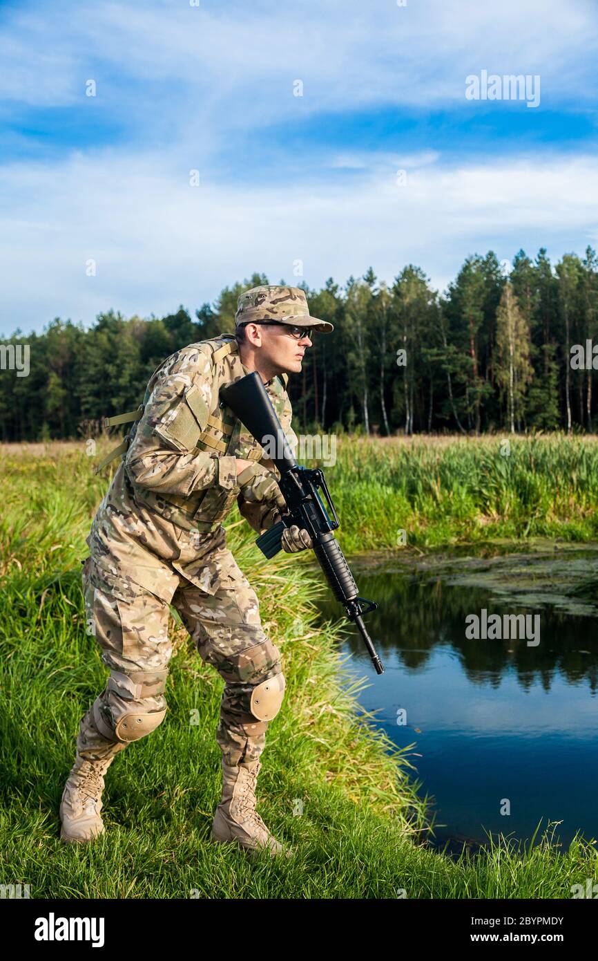 Soldier with a rifle Stock Photo - Alamy