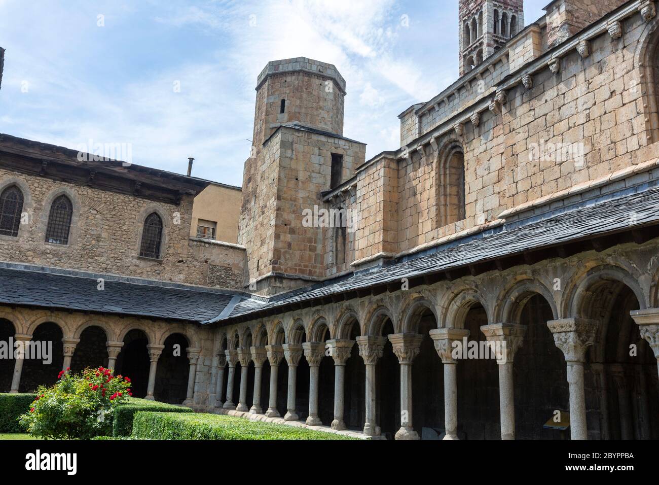 Cloister with carved figures in the capital of columns, La Seu d'Urgell ...