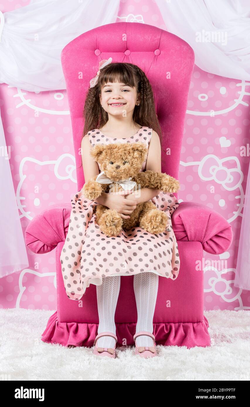Little Girl Hugging Teddy Bear Stock Photo - Alamy