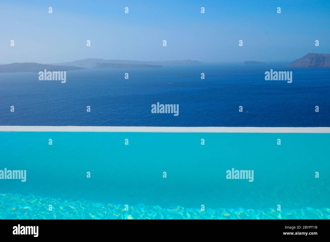infinity pool Santorini Greece looking out over the caldera of the ...