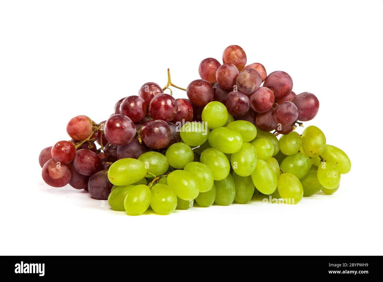 Bunch of White and Red Grapes laying isolated Stock Photo - Alamy