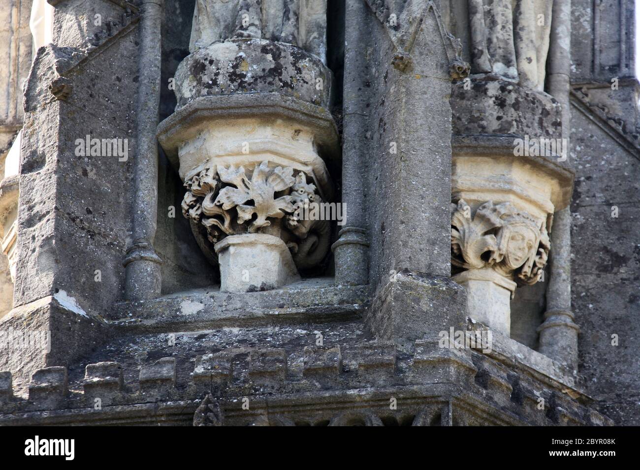 The famous imp on Ilam Cross which is a gothic style memorial to Mary ...