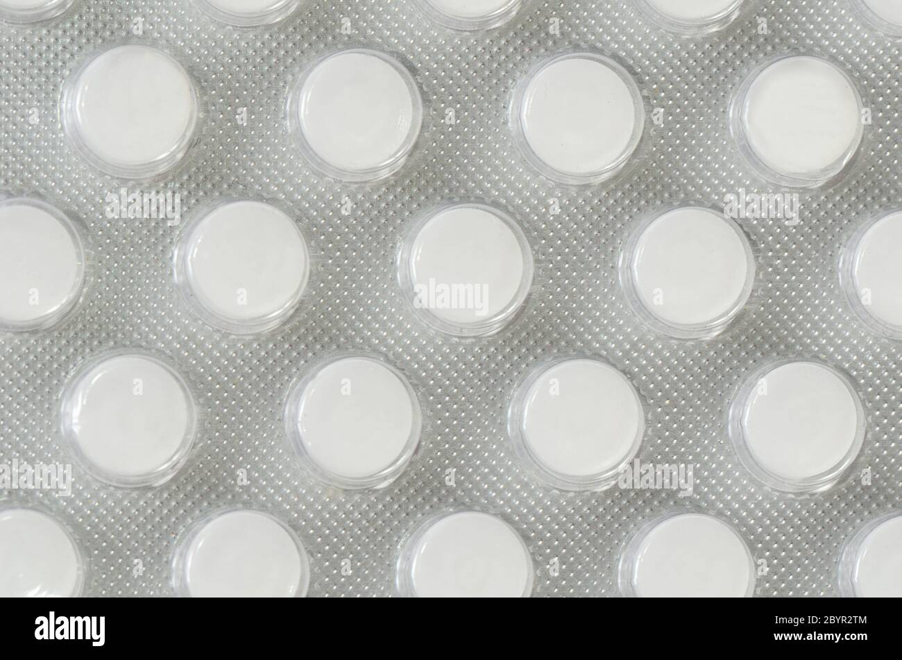 Tablets in packing. A medical background Stock Photo - Alamy