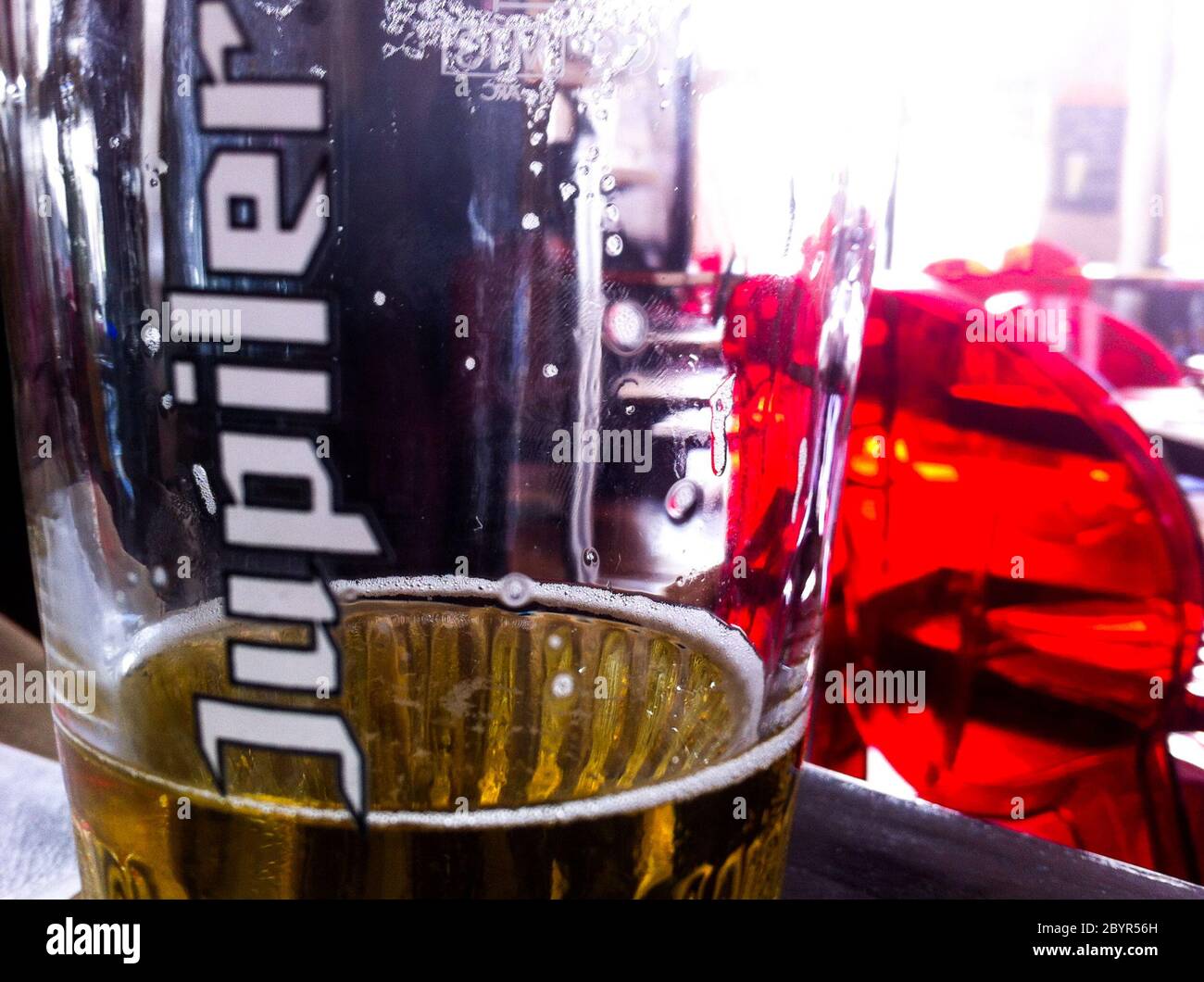 Glass of Jupiler beer, France Stock Photo - Alamy
