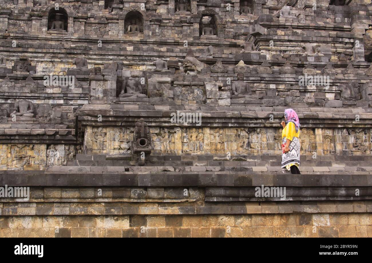 BOROBUDUR, INDONESIA - June 10, 2013: Local muslim woman at Borobudur ...