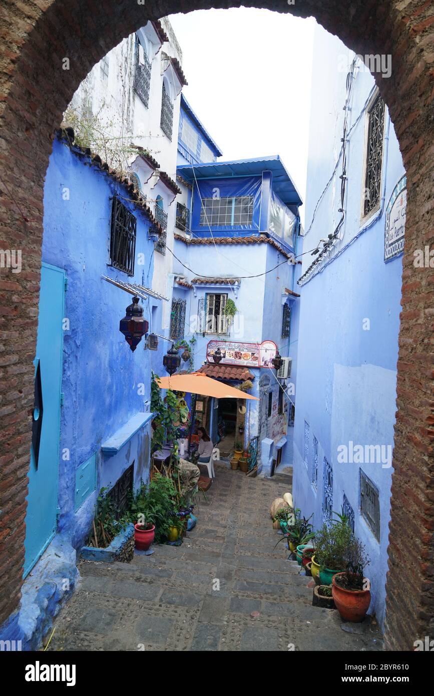 An alley in the unique blue-painted city of Chefchaouen, originally ...