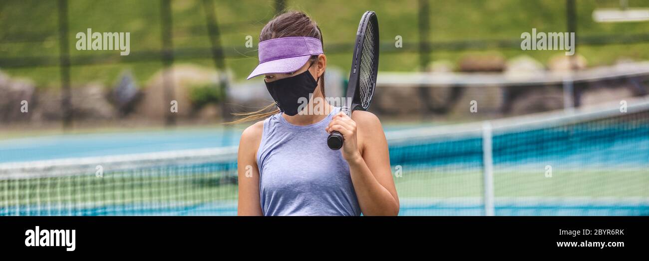 Tennis court reopen after covid-19 confinement. Woman athlete player ...