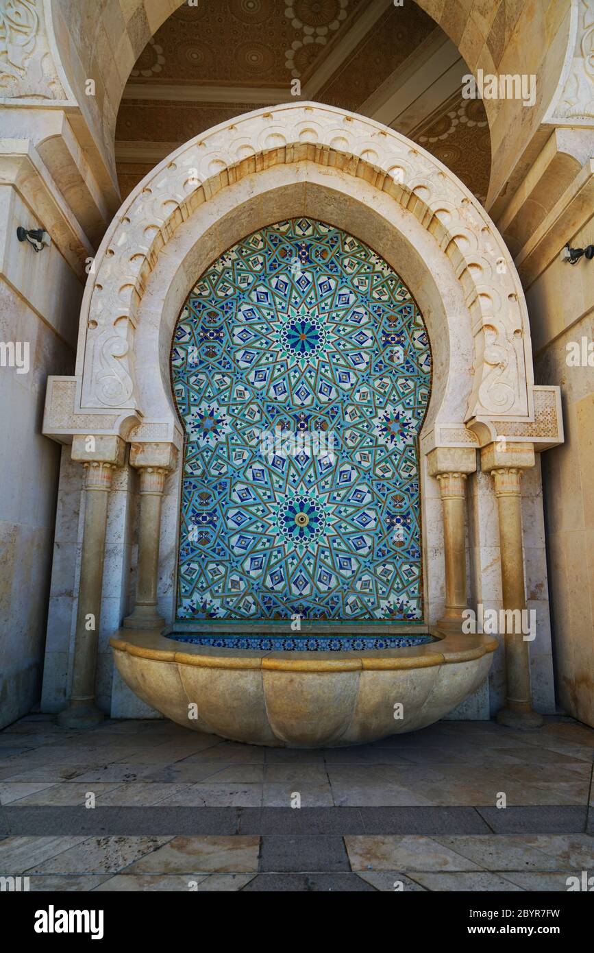 A water fountain, for drinking water is set into the side of the Hassan ...