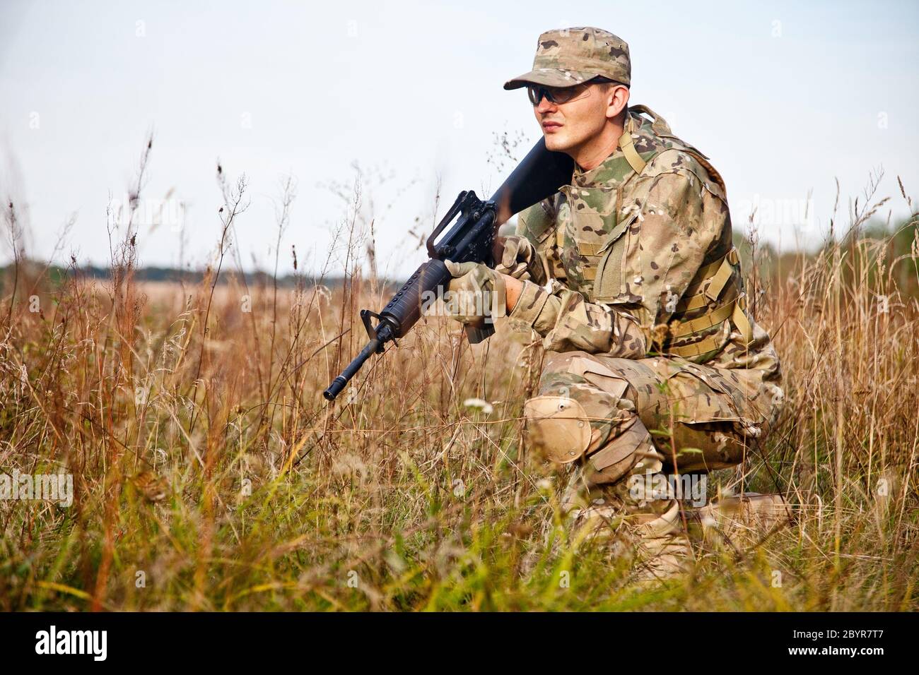 Soldier with a rifle Stock Photo - Alamy