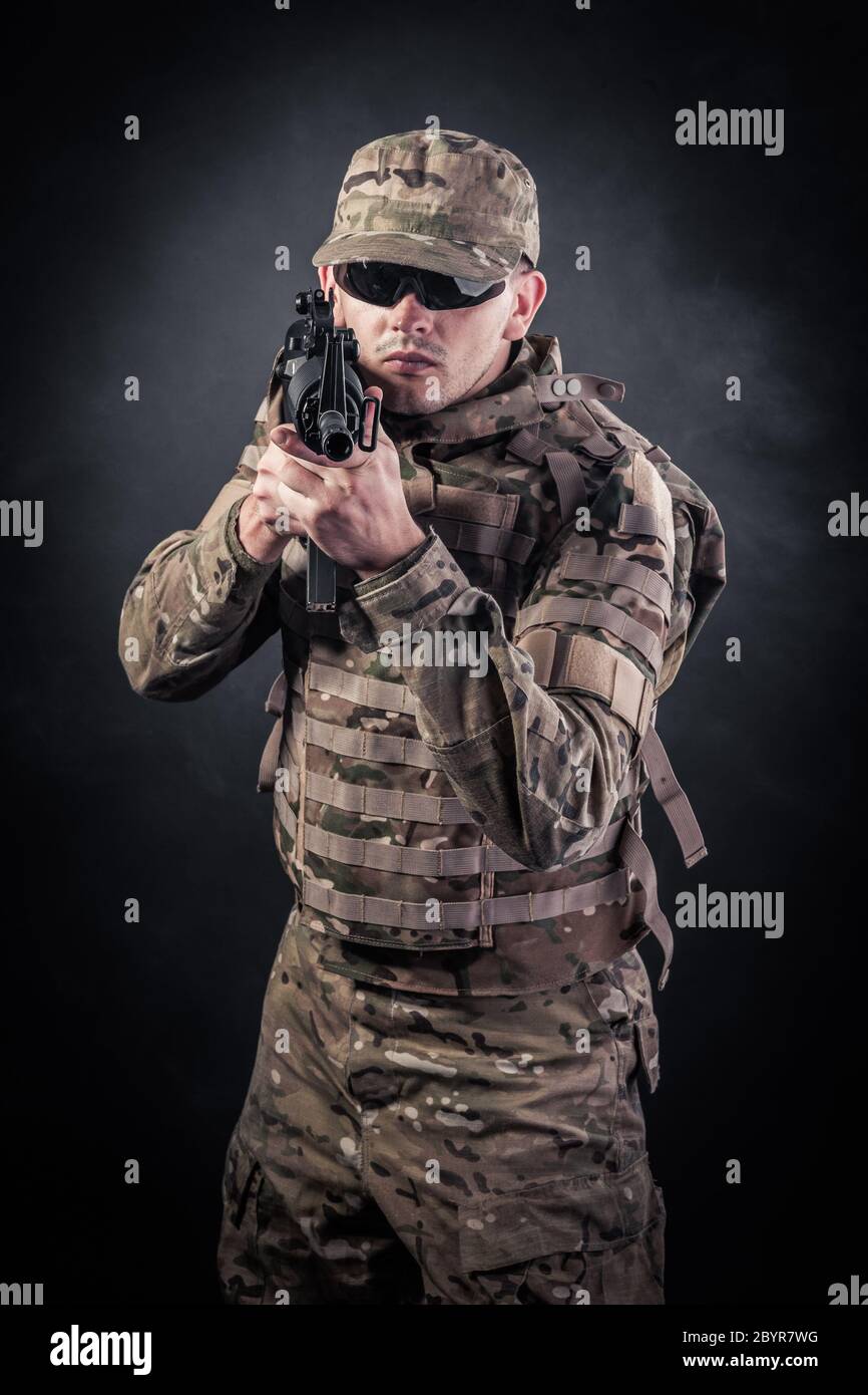 Modern soldier with rifle Stock Photo - Alamy