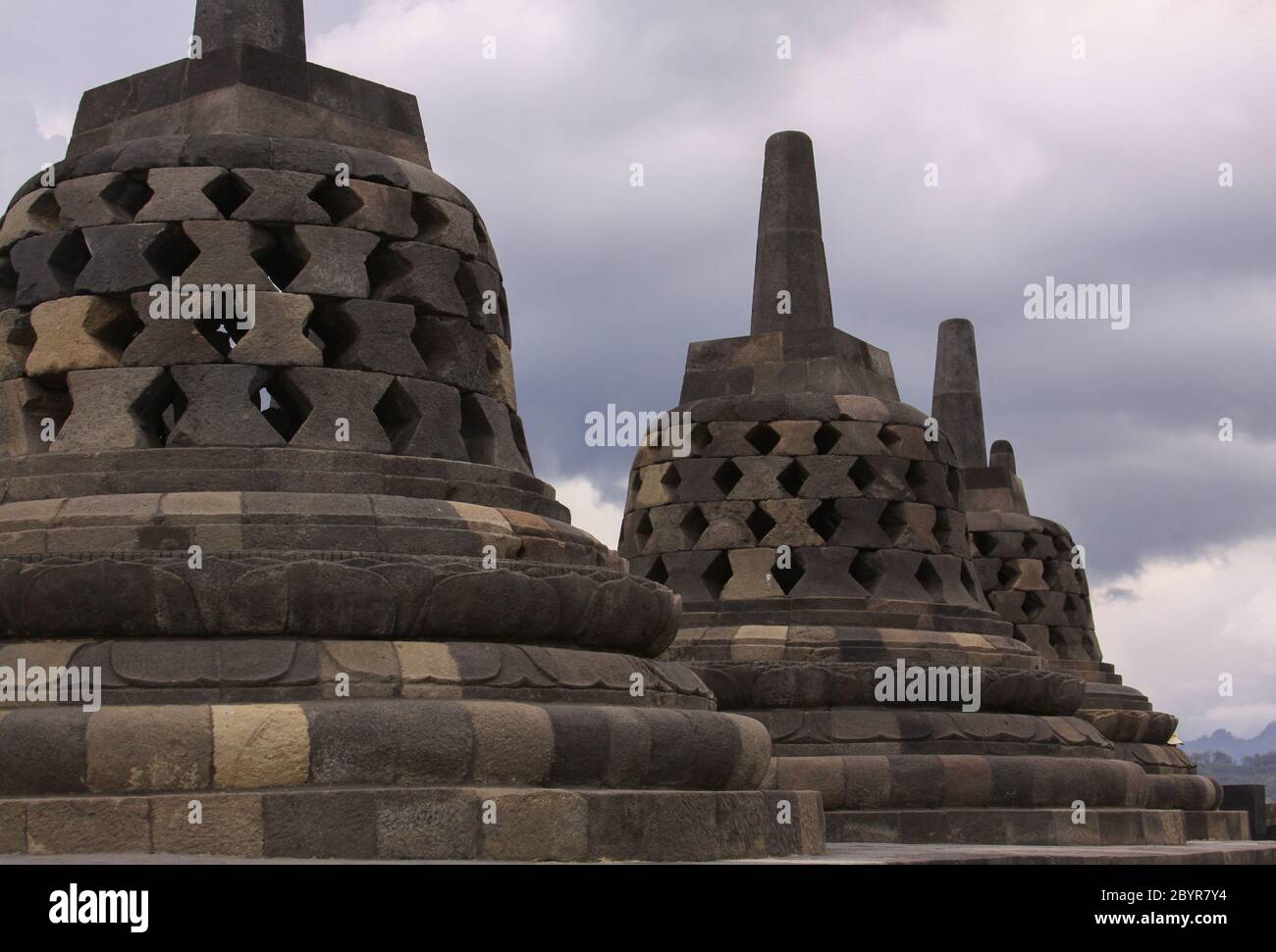 Stupas stone bell structures at Borobudur temple in Java Indonesia ...
