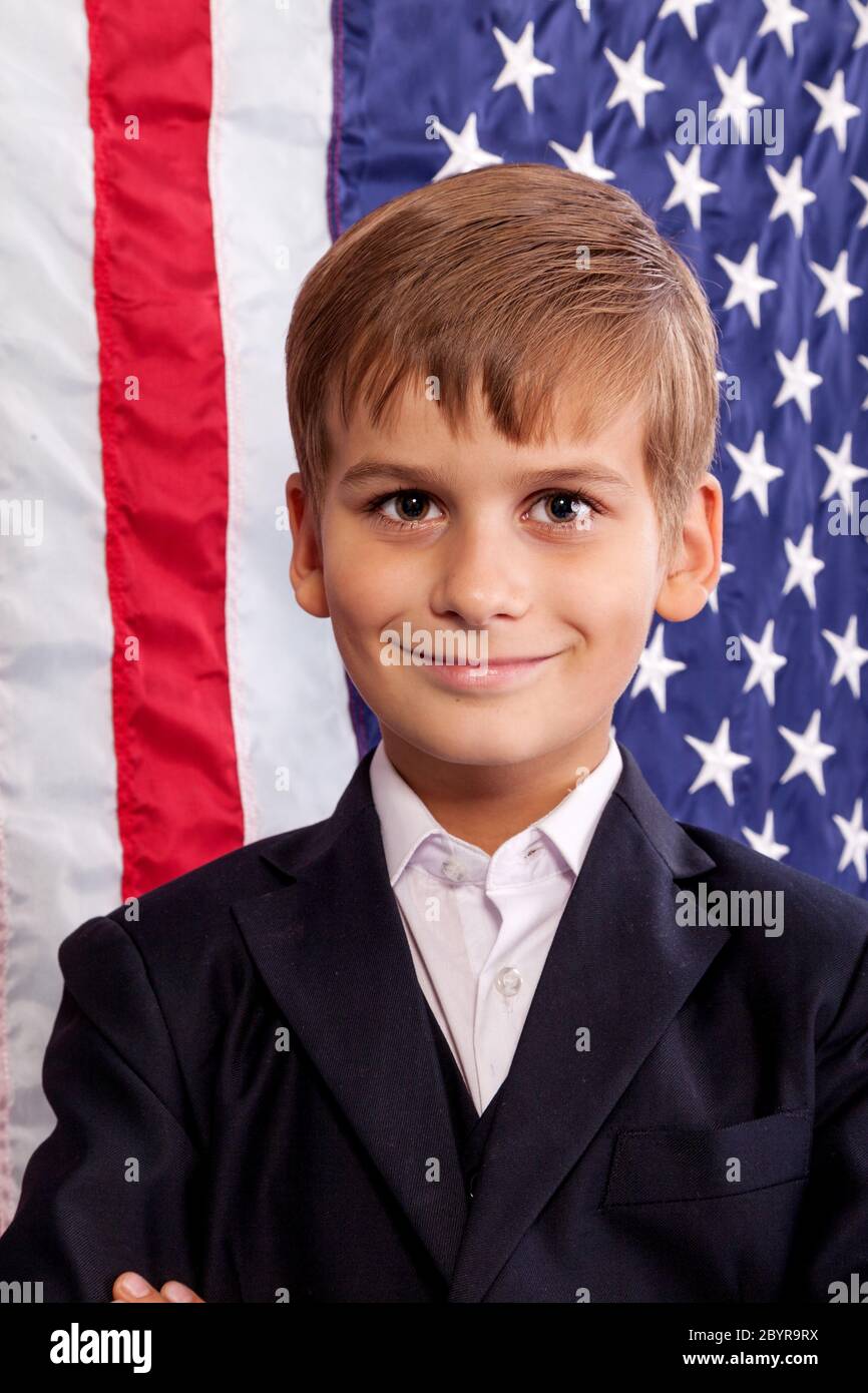Portait of Caucasian boy with American flag Stock Photo - Alamy